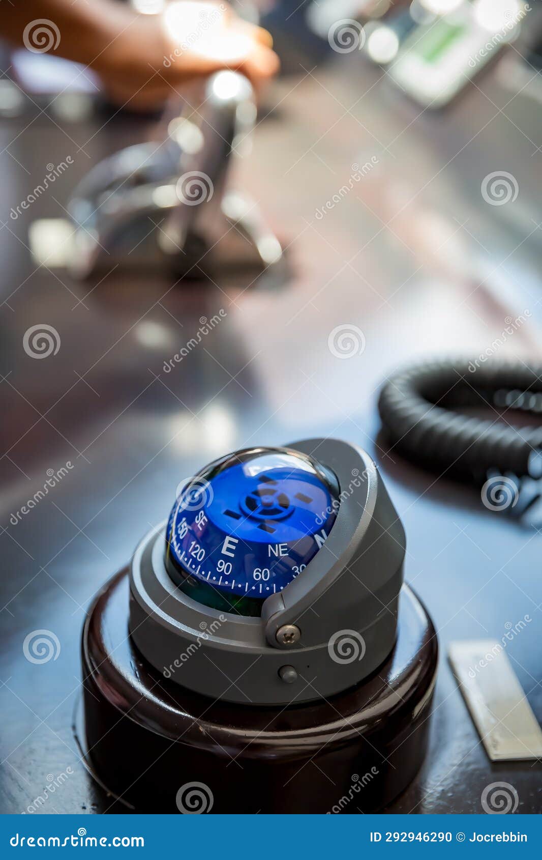Power Boat Bridge with Compass and Hand of Captain on Controls Stock ...