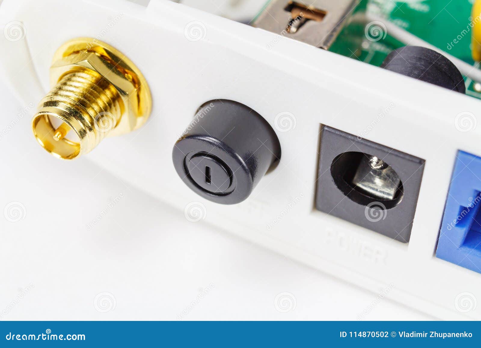 Power Button with Antenna and Power Connectors on the Back Panel of the ...