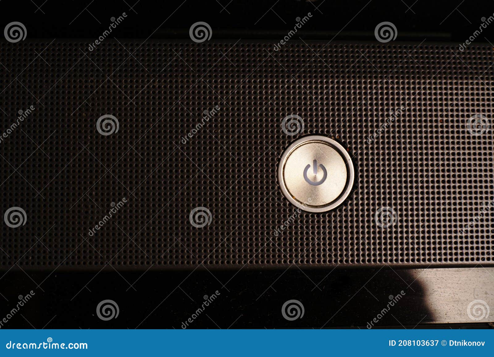 The Power Button of the Laptop. the Mesh of the Speakers of the Laptop ...