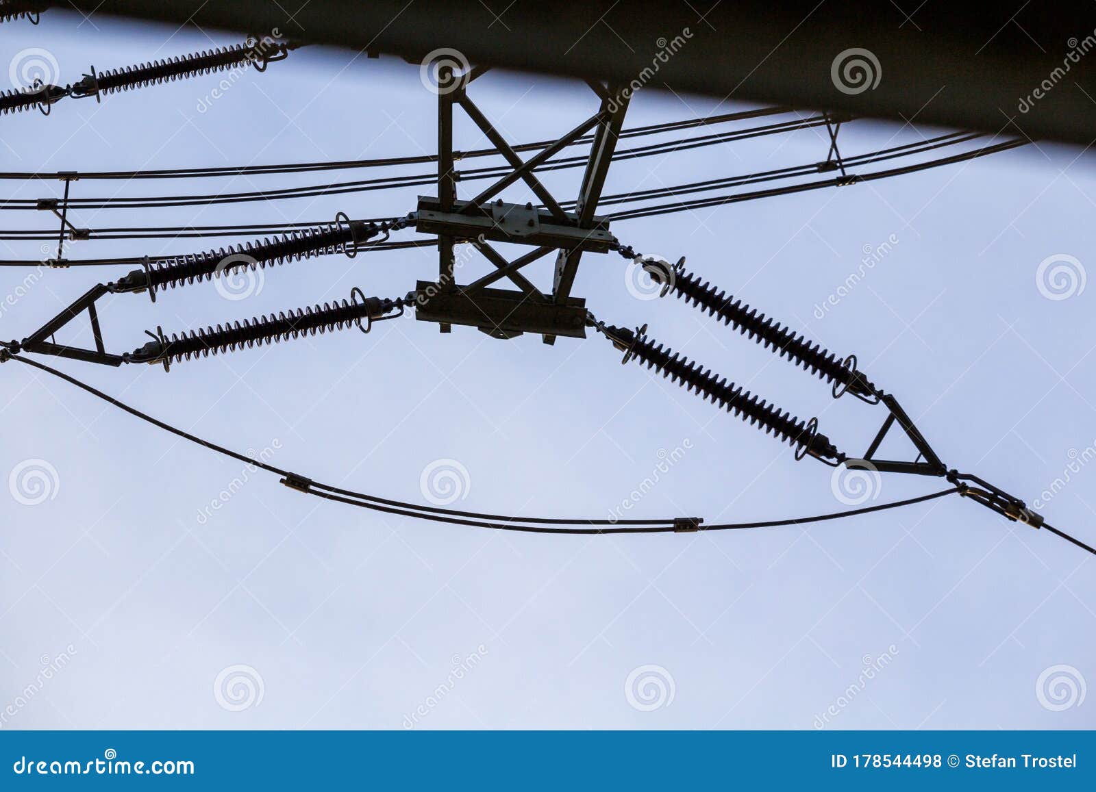 Ceramic Insulation For Electric Cable Hanging On The Electric Pylon ...