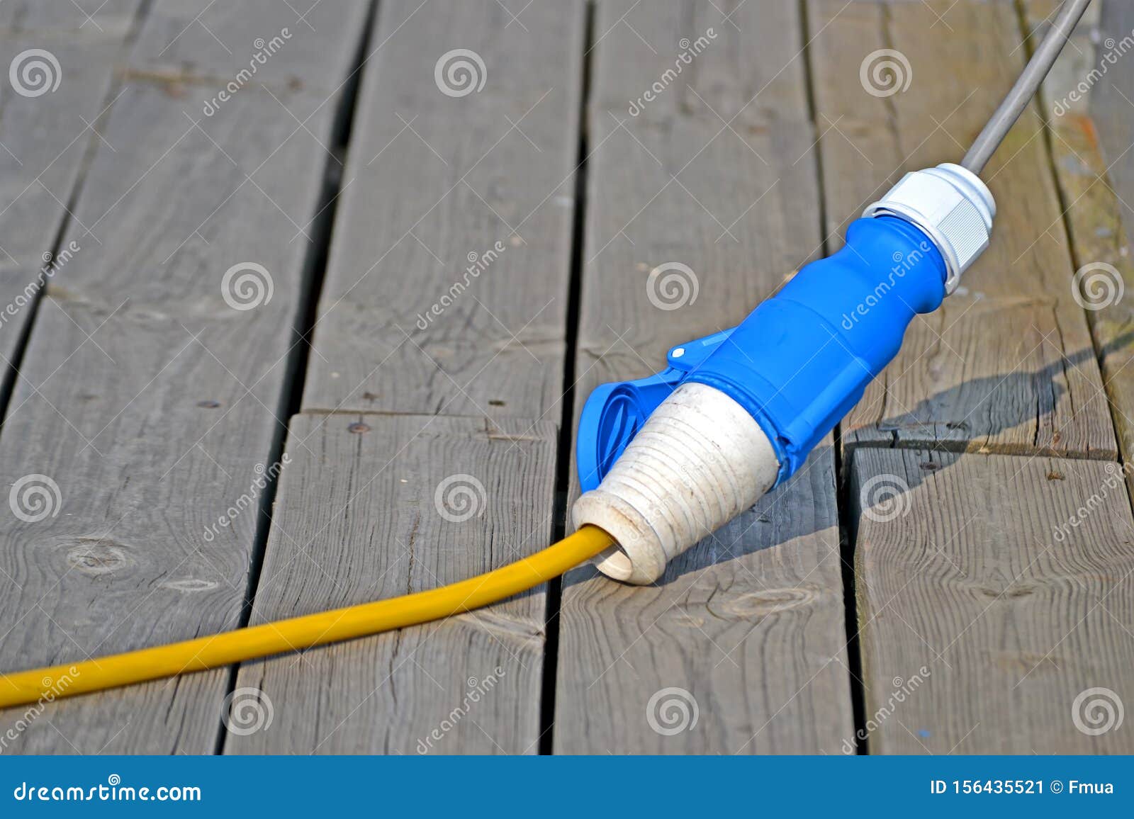 Power Cable Waterproof Connector on Vintage Wooden Surface, Electric ...