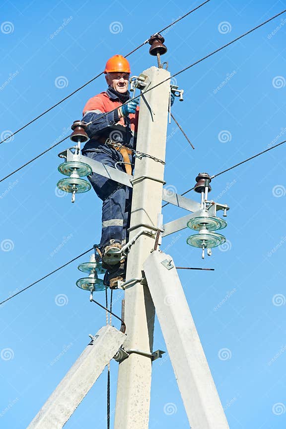 Power Electrician Lineman at Work on Pole Stock Photo - Image of high ...