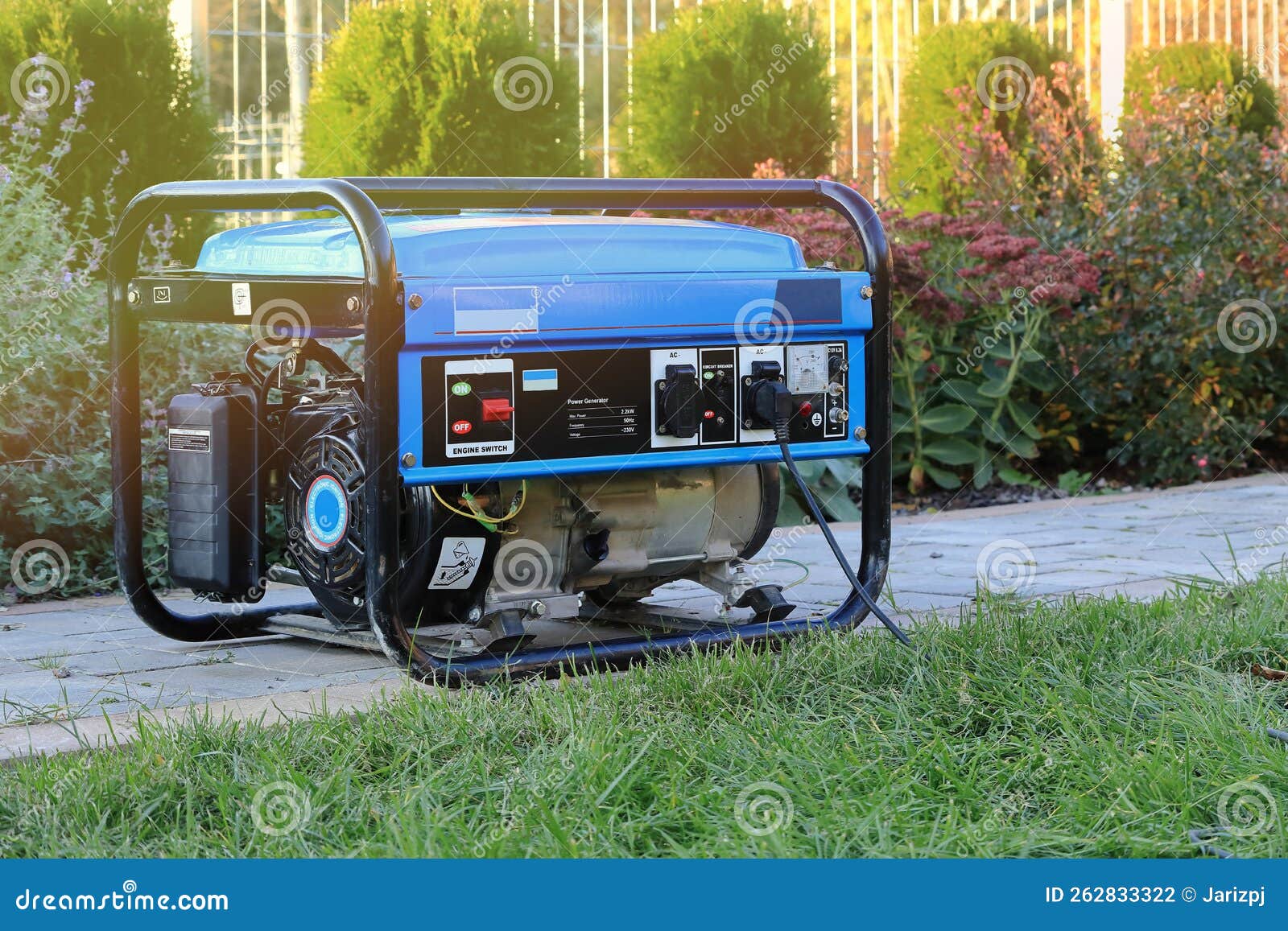 Power Generator Standing in the Garden on the Pavement Stock Photo ...