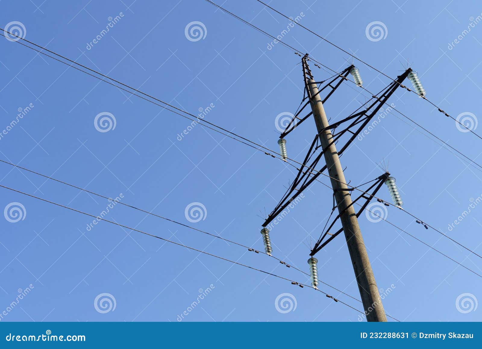 Power Line Distribution Pole Against the Blue Sky Stock Image - Image ...