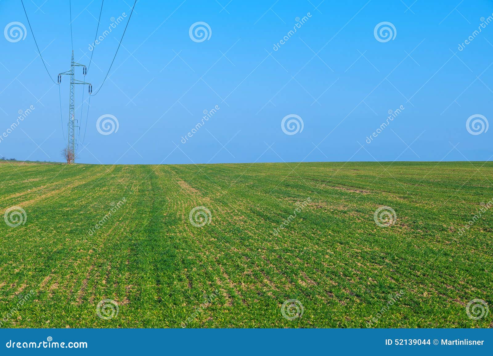 Power Line, Green Field with Blue Sky Stock Photo - Image of field ...