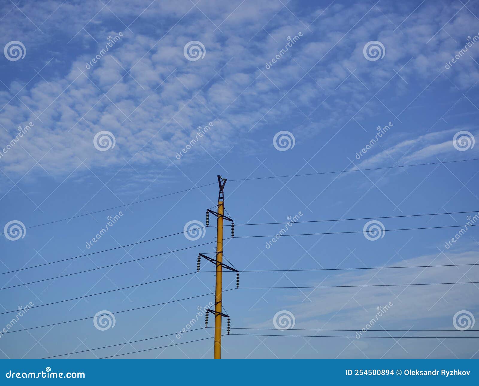 Power Line Pole in Close-up Against a Blue Sky Background Stock Photo ...