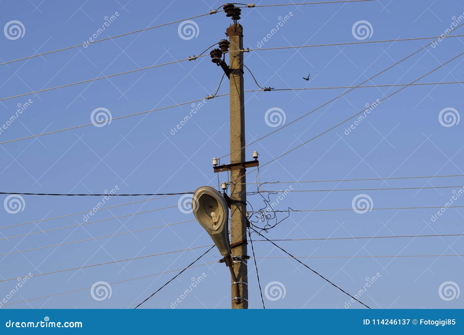 Power Line Post with a Street Lighting Lamp. Blue Sky. Stock Image ...