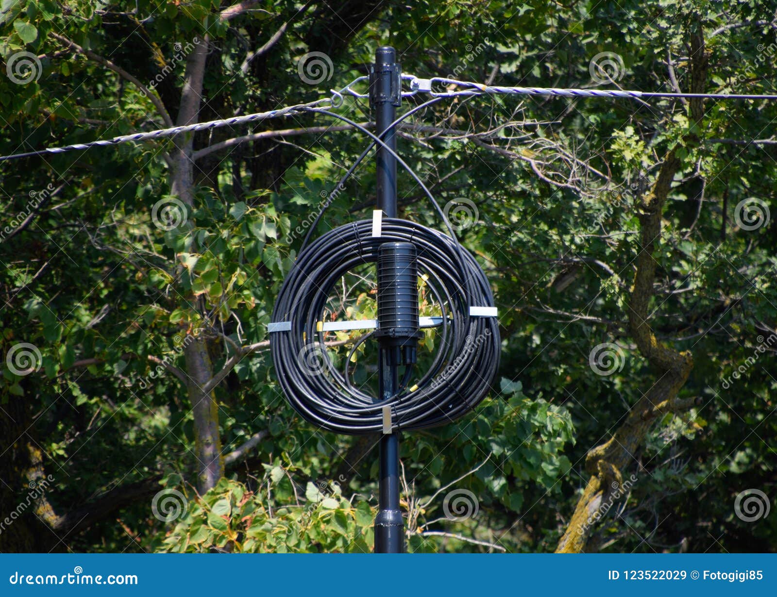 Power Line Post with a Wound Wire. the New Wire is on the Pole Stock ...