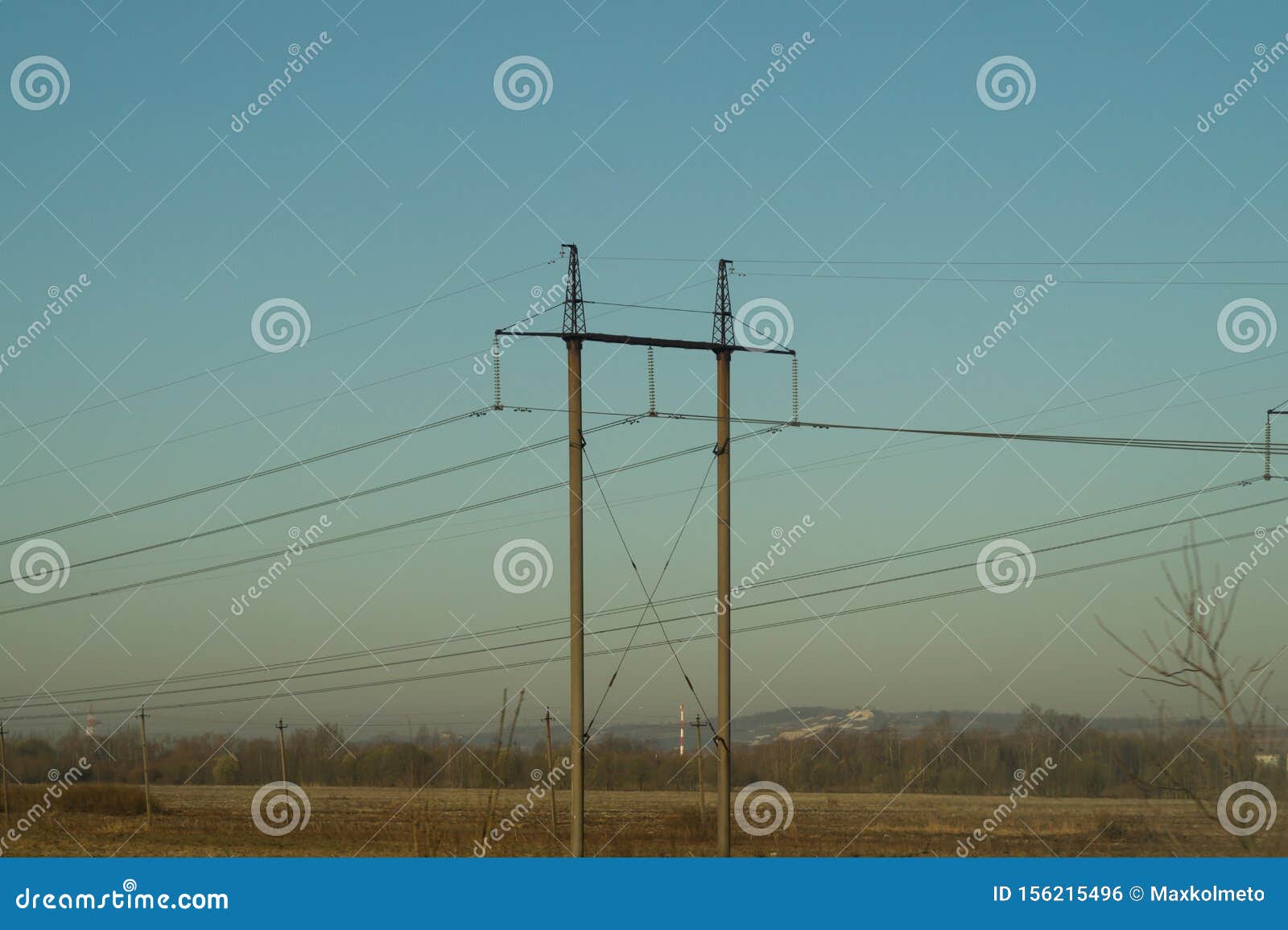 Power Line Posts. High Voltage Tower on the Sky Background Stock Photo ...