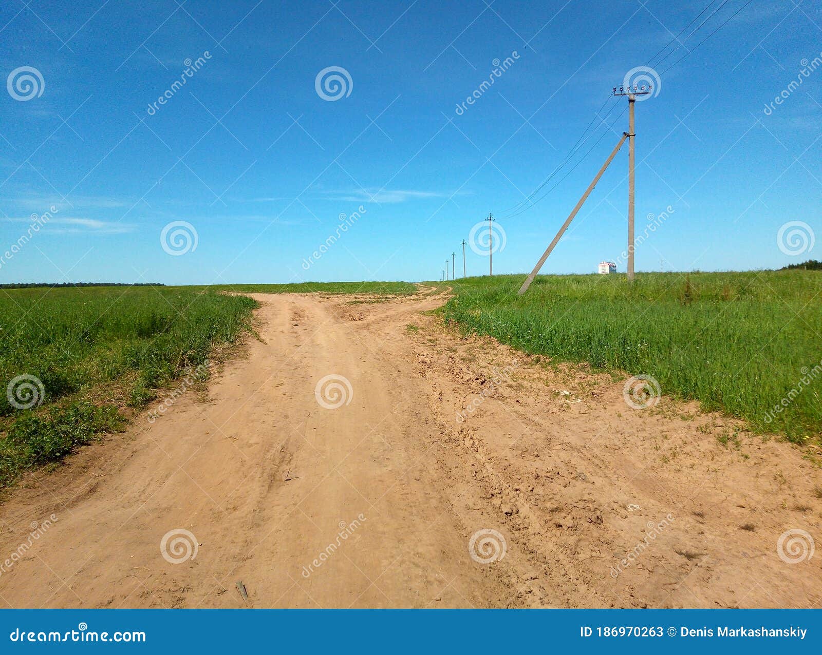Power Line on the Side of a Dirt Road Stock Image - Image of landscape ...