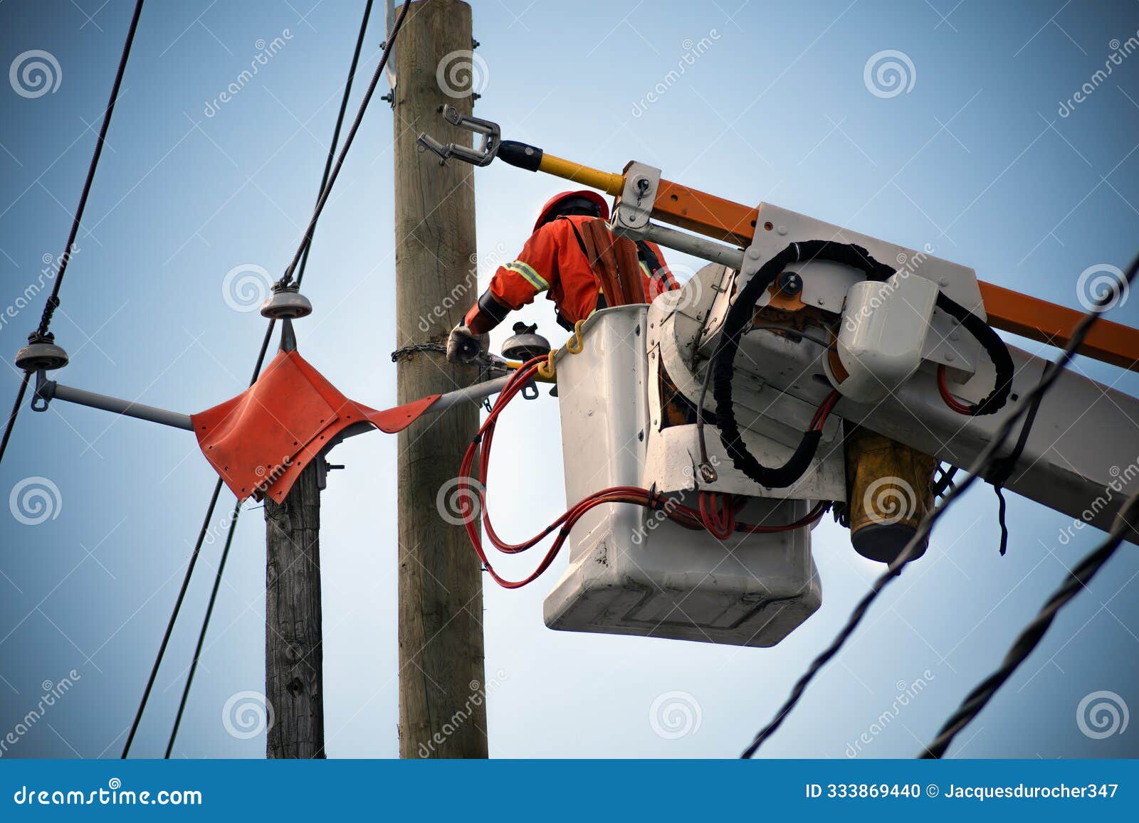 Electricity Line Worker Repairing Power Lines Using Aerial Platform ...