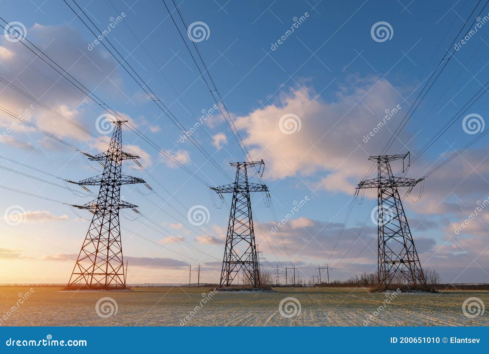 Power Lines during a Beautiful Winter Sunset Stock Photo - Image of ...