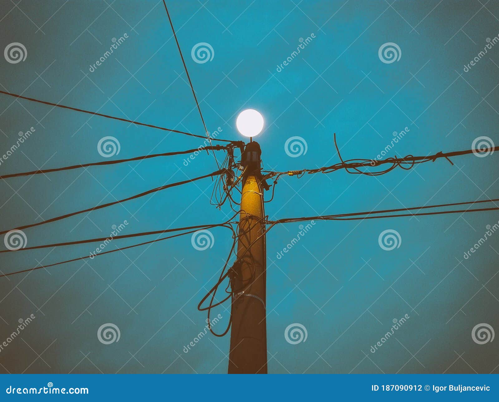 Power Lines in the City. Electric Cables Attached To a Street Power ...