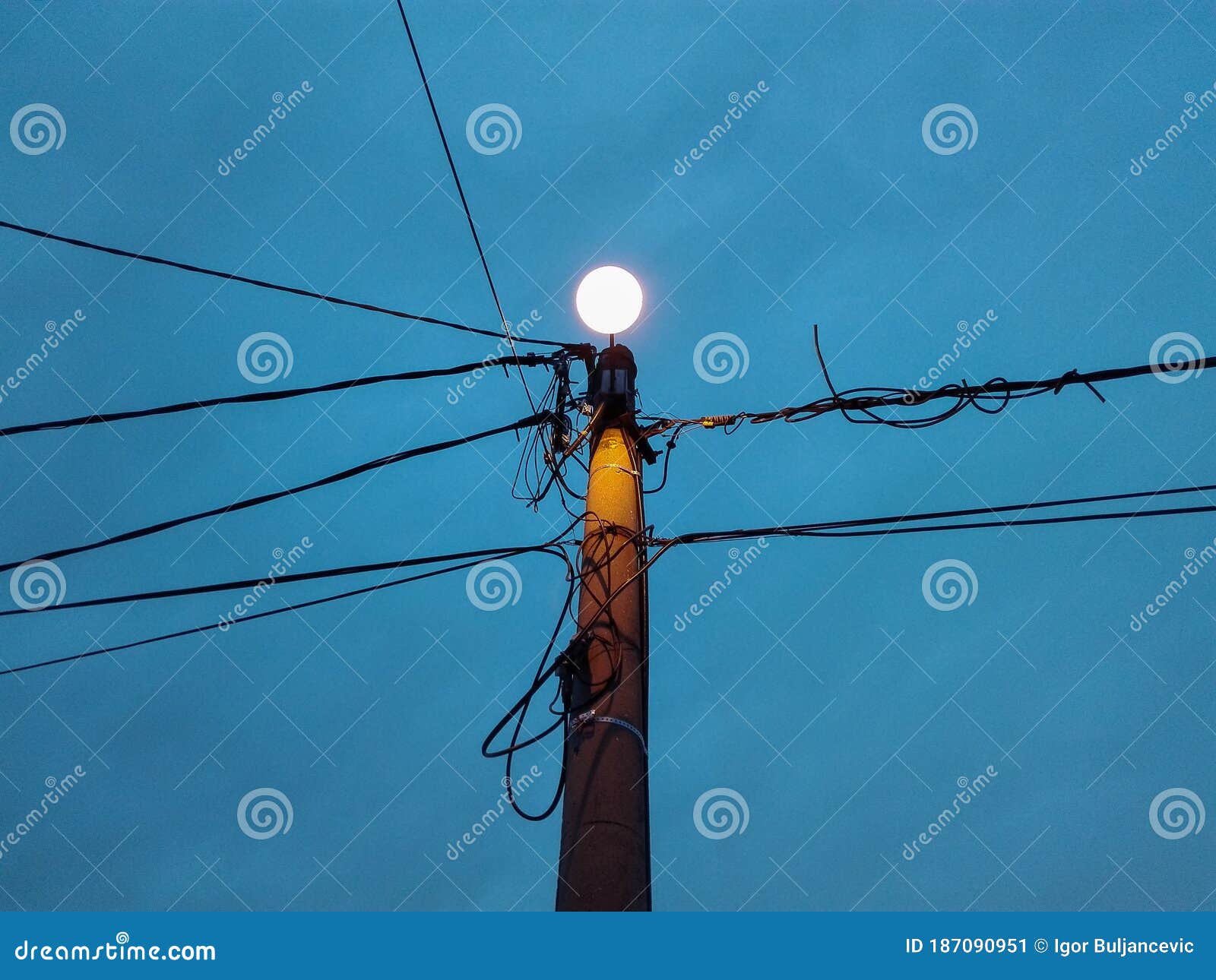 Power Lines in the City. Electric Cables Attached To a Street Power ...