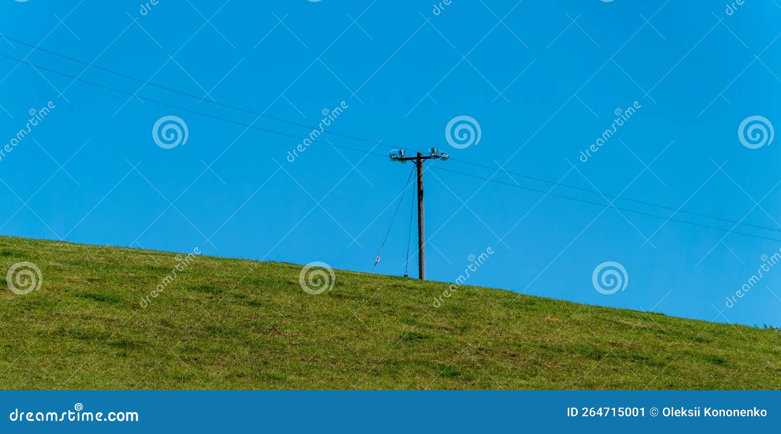 A Power Lines in a Field. Minimalistic Landscape, Electric Post on ...