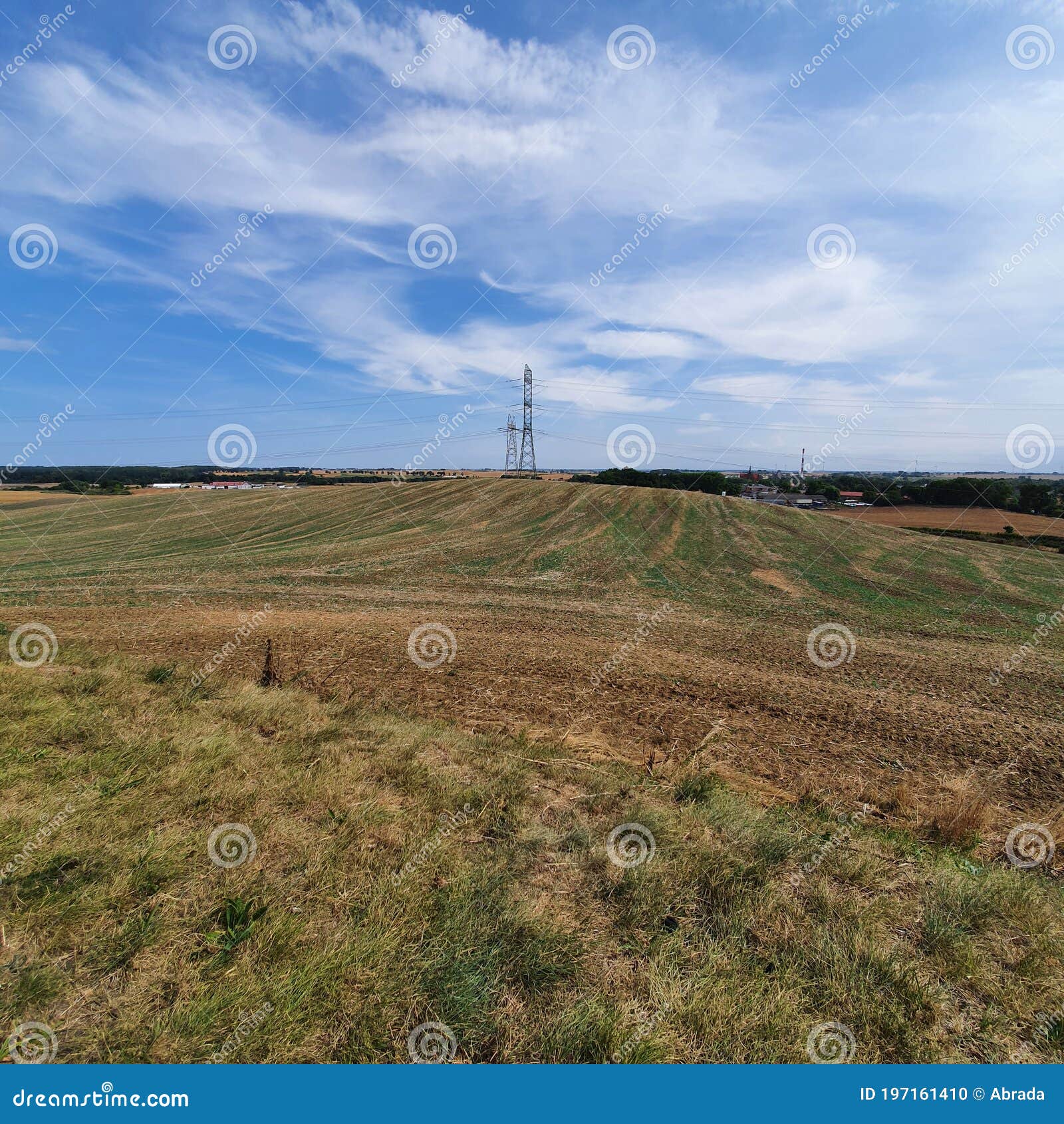 Power lines in the field stock photo. Image of landscape - 197161410