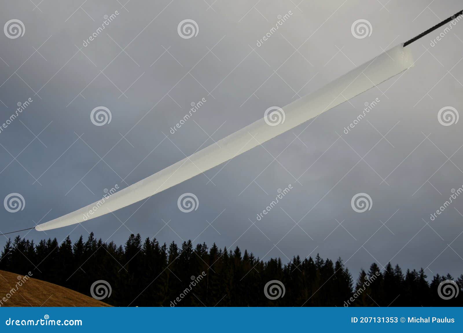 Power Lines Frozen by a Large Layer of Ice in the Shape of a Cylinder ...