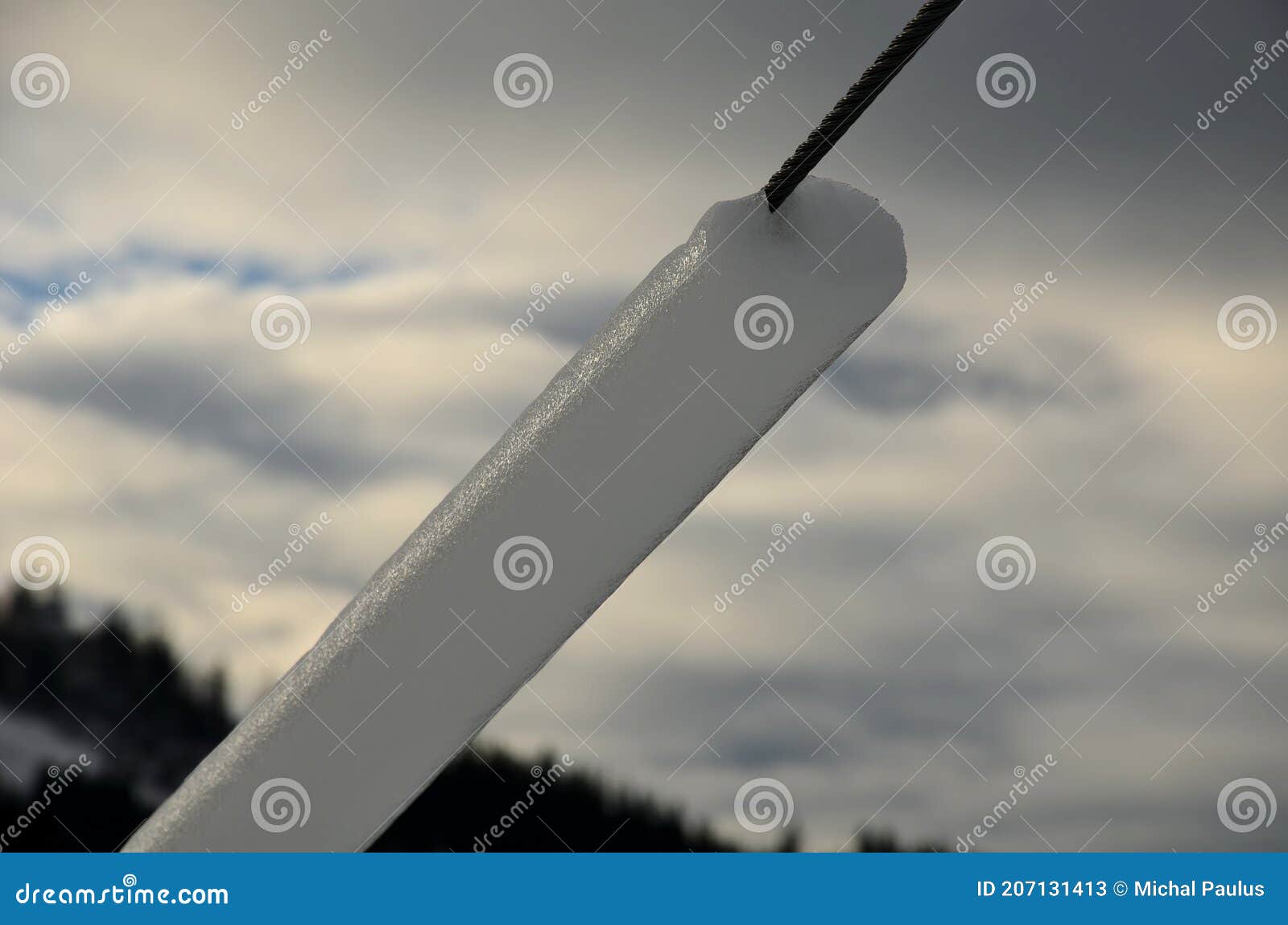 Power Lines Frozen by a Large Layer of Ice in the Shape of a Cylinder ...