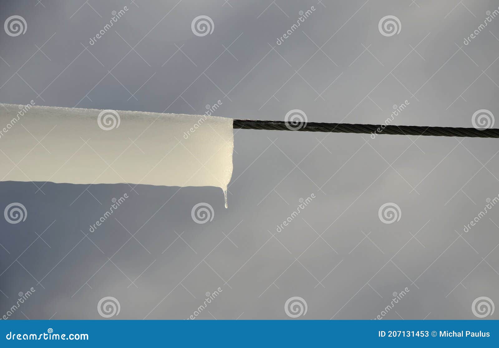 Power Lines Frozen by a Large Layer of Ice in the Shape of a Cylinder ...