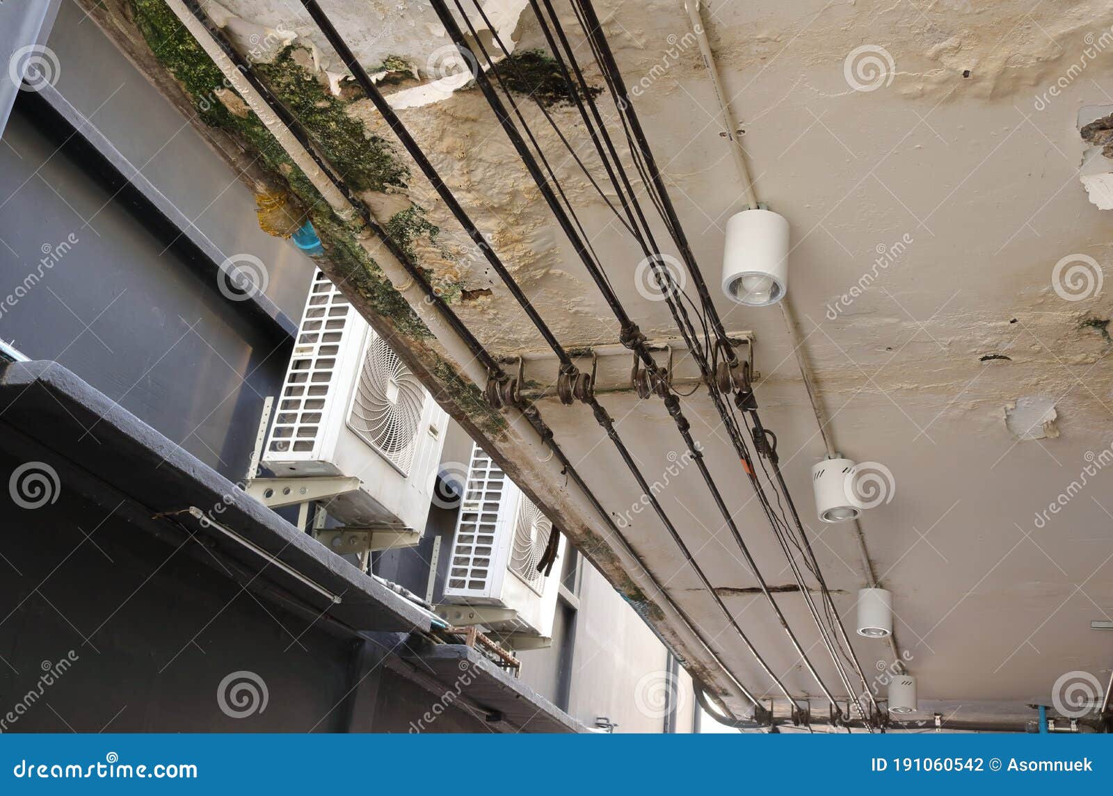 Power Lines Run Under Ceiling of Worn Out Canopy Stock Photo - Image of ...