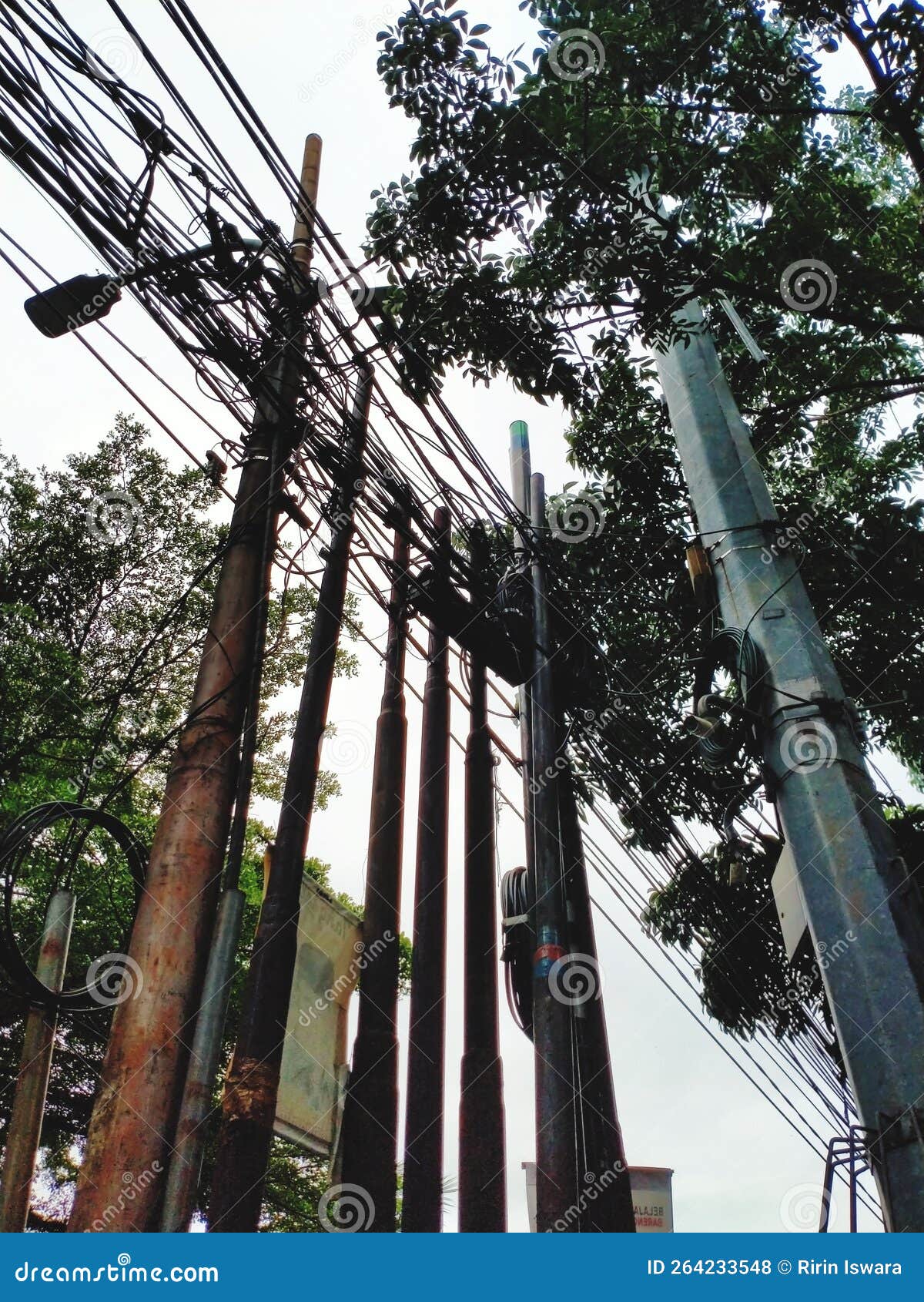Power Lines on the Side of the Road Stock Photo - Image of bridge, road ...