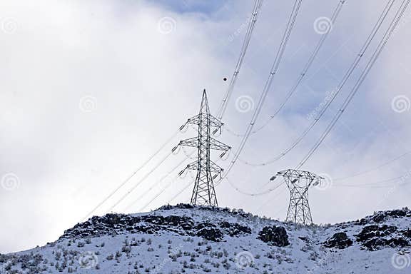 Power Lines on Snow Covered Hills Stock Photo - Image of power, snow ...