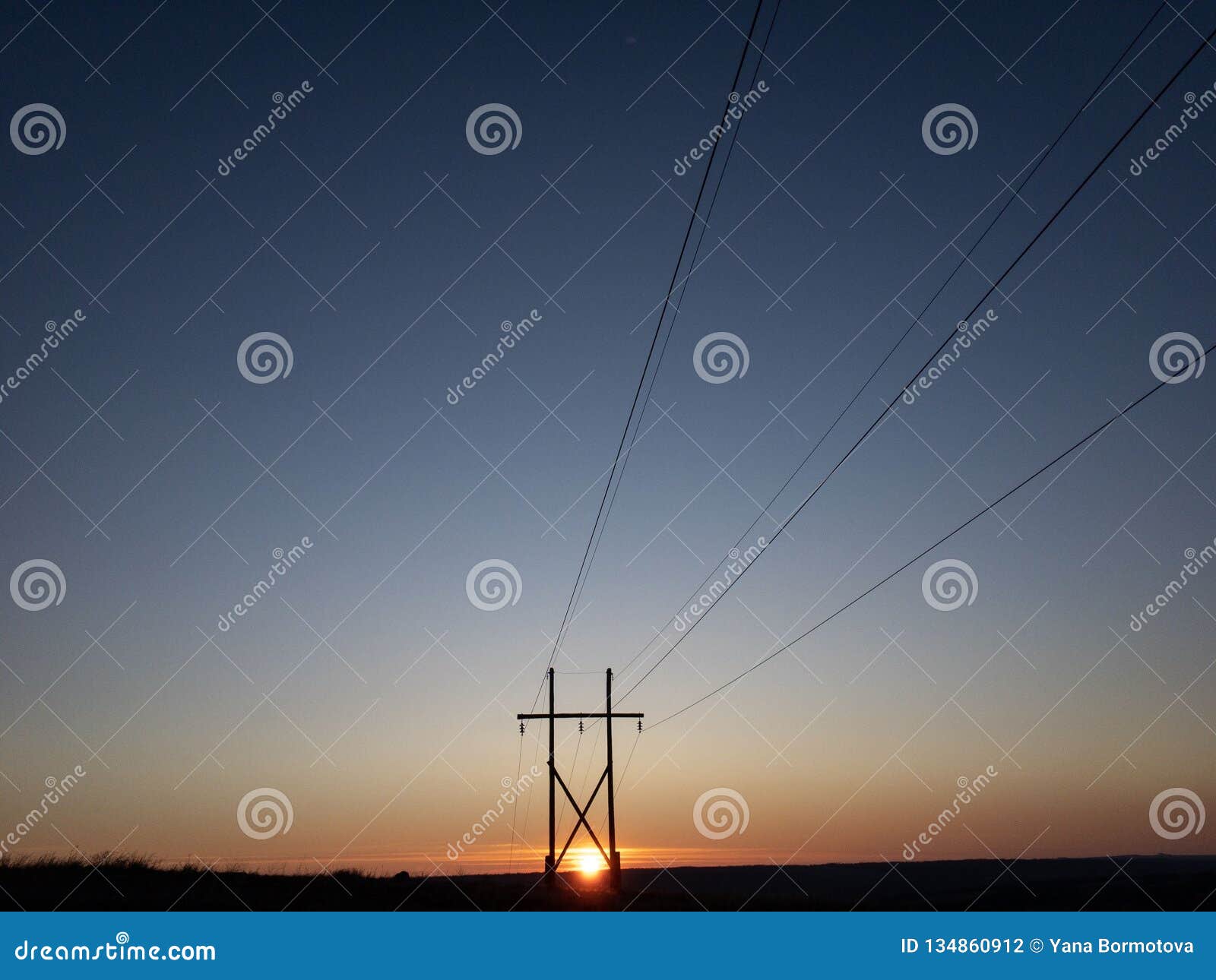 Power lines at the sunset stock photo. Image of cable - 134860912