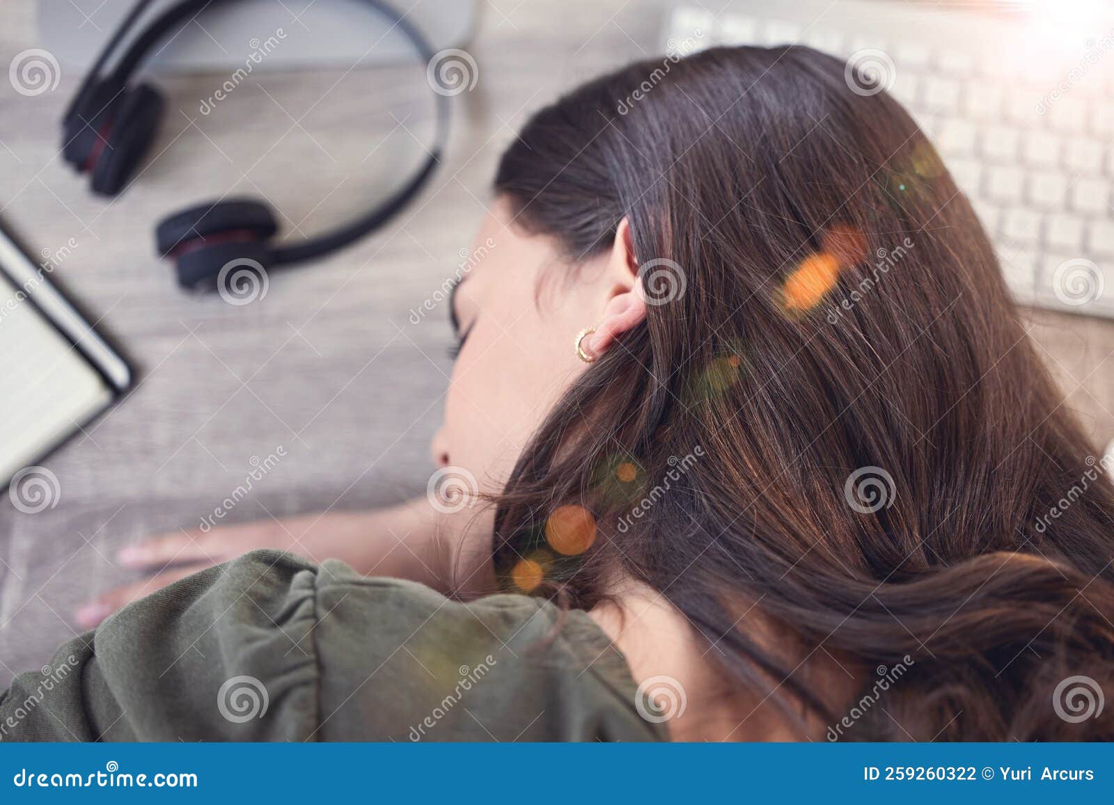 A Power Nap Might Work. a Young Female Call Center Agent Taking a Nap ...