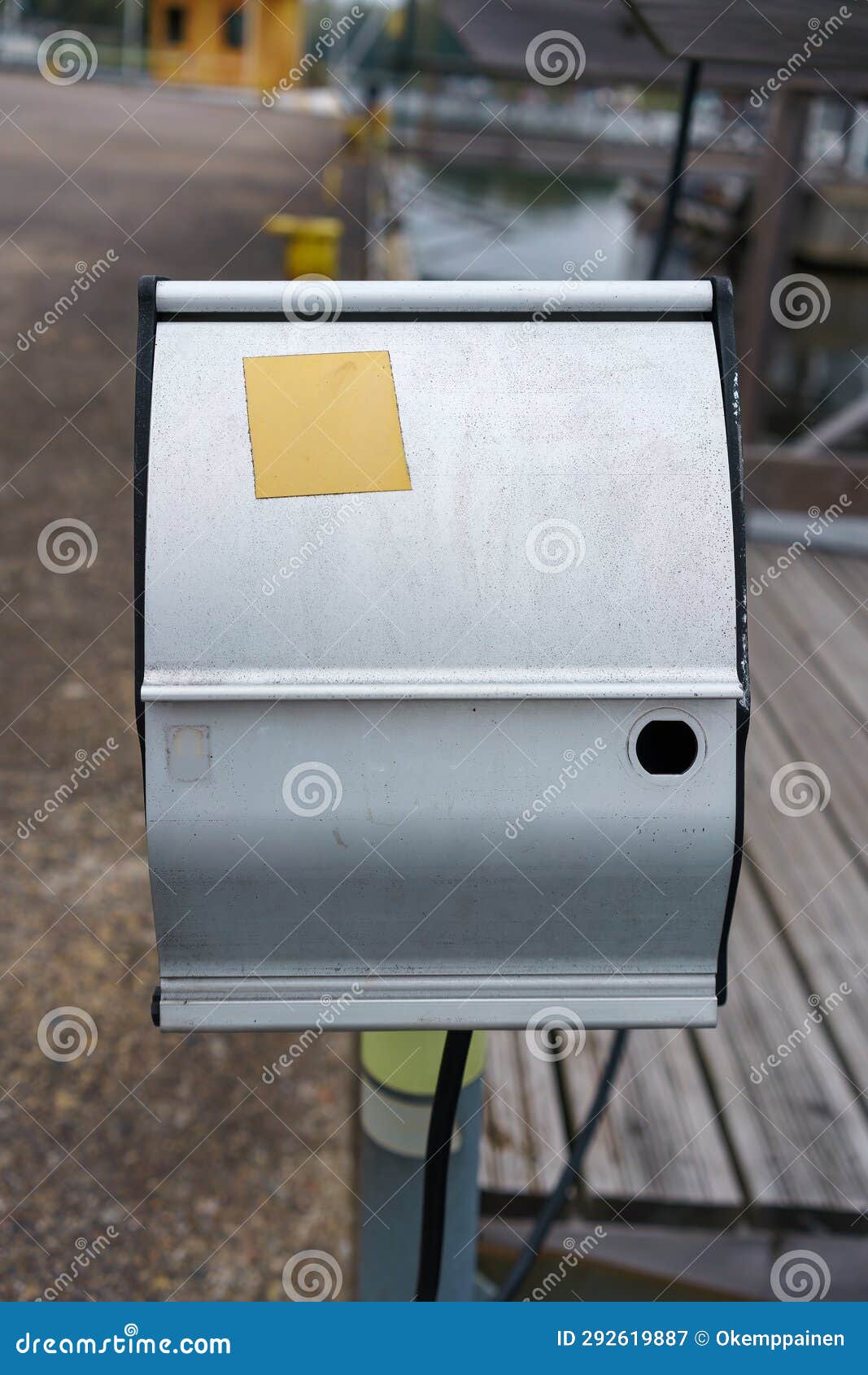 Power Outlet Box in the Harbor with Yellow Empty Sticker Stock Image ...