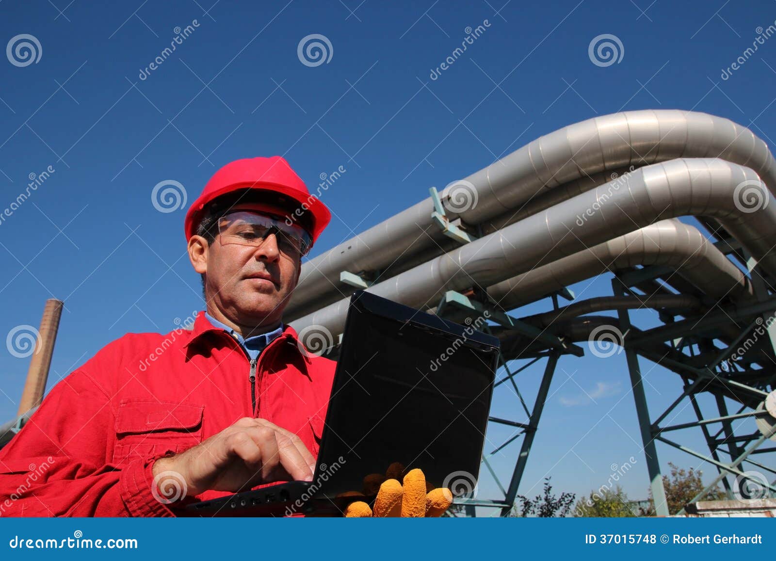 Power Plant Worker with Notebook Computer Stock Photo - Image of ...