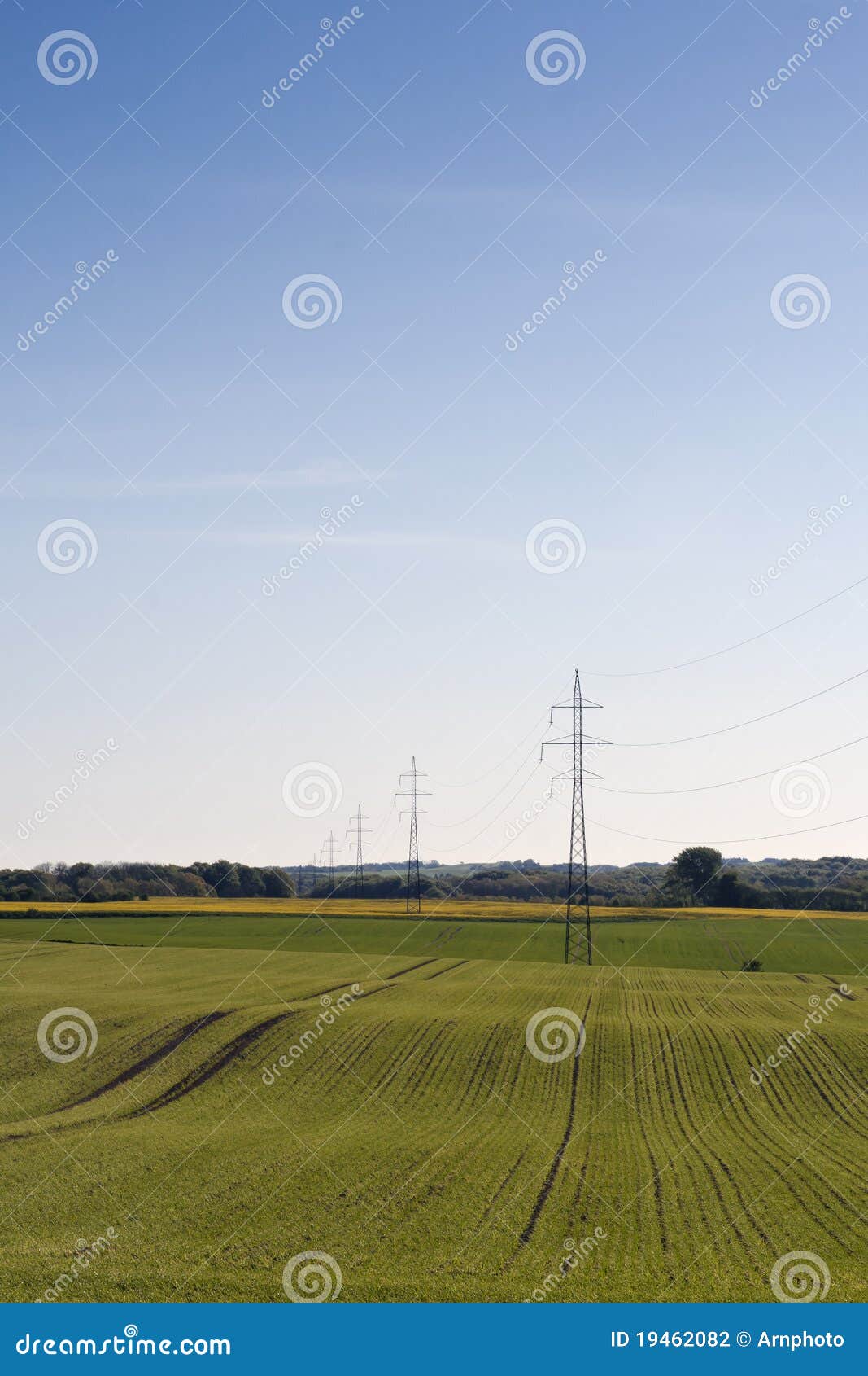Power Pylons in the Field stock photo. Image of green - 19462082