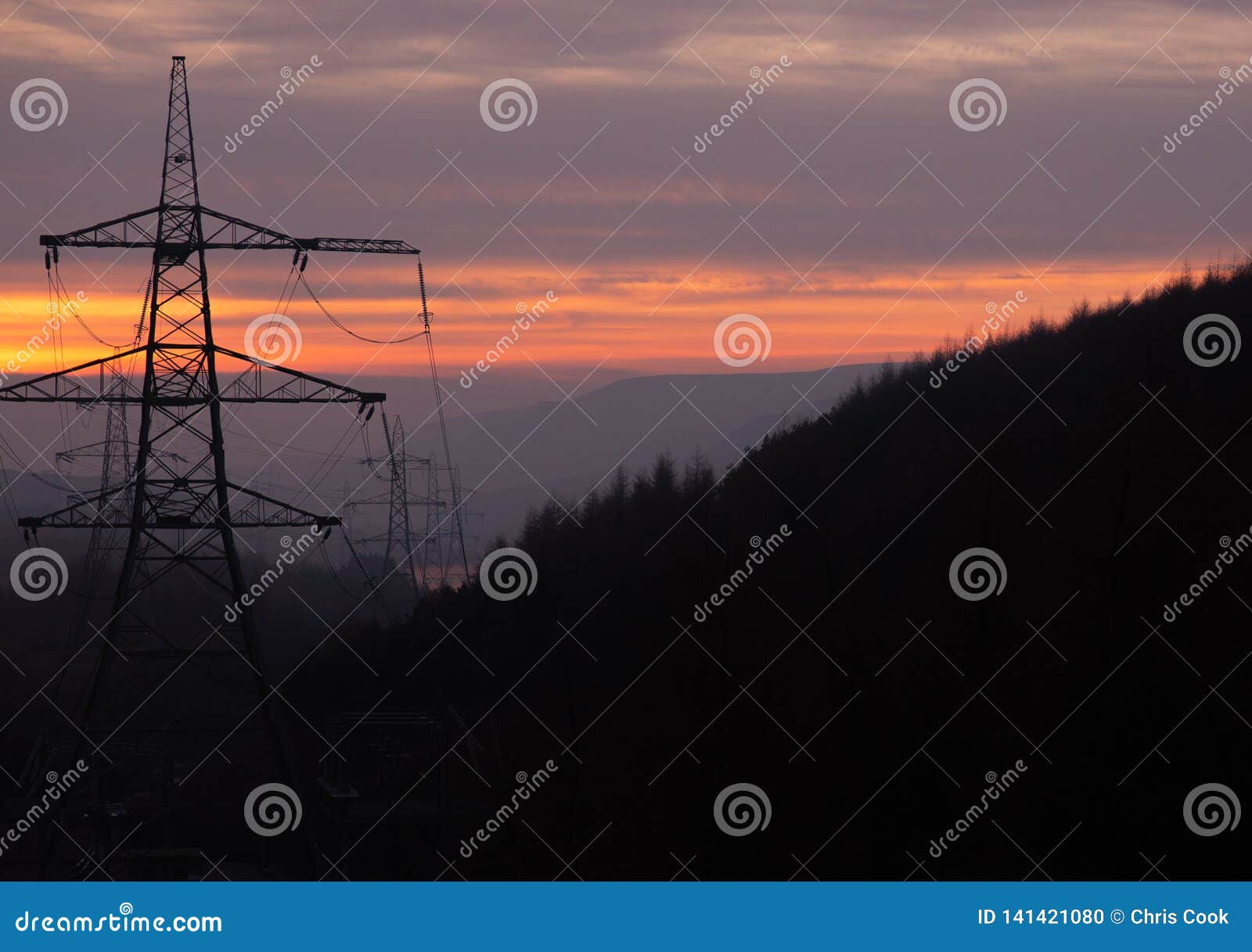 Power Pylons Run through a Forest at Sunset in the UK, Peak District ...
