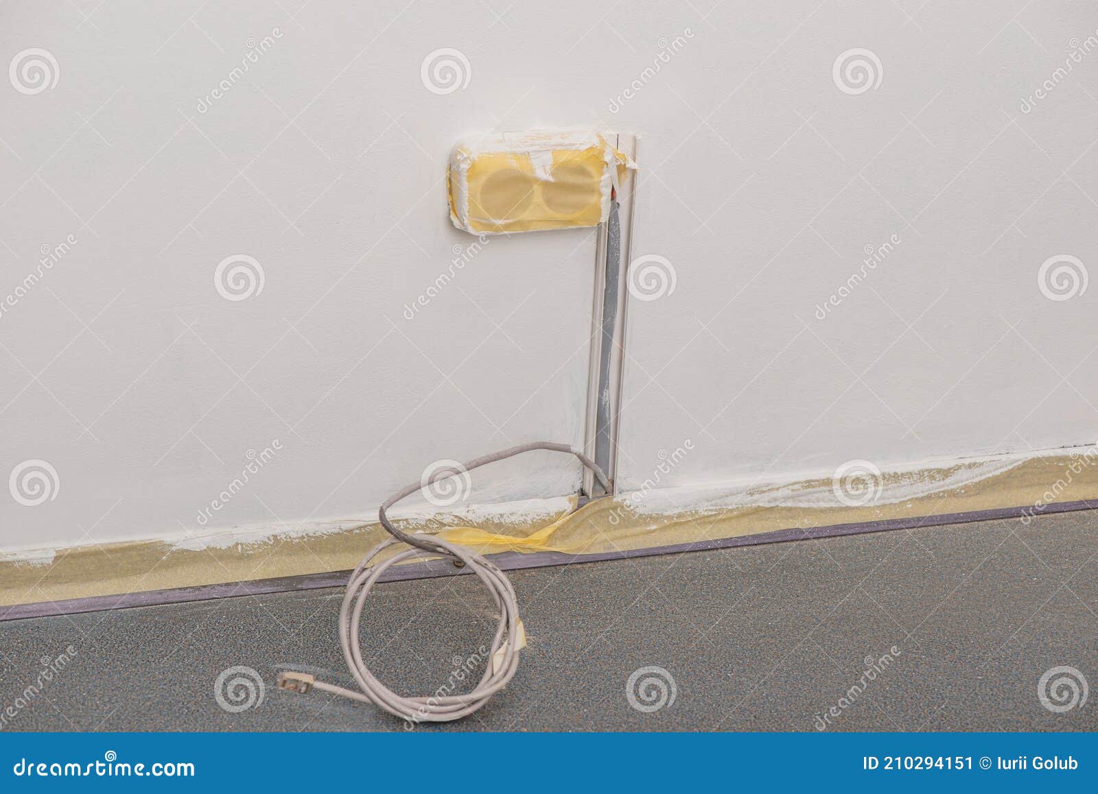 Power Socket Covered with Masking Tape while the Wall Being Painted ...