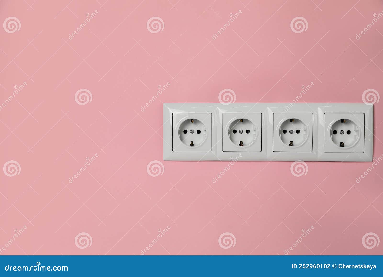 Power Sockets on Pink Wall, Space for Text. Electrical Supply Stock ...