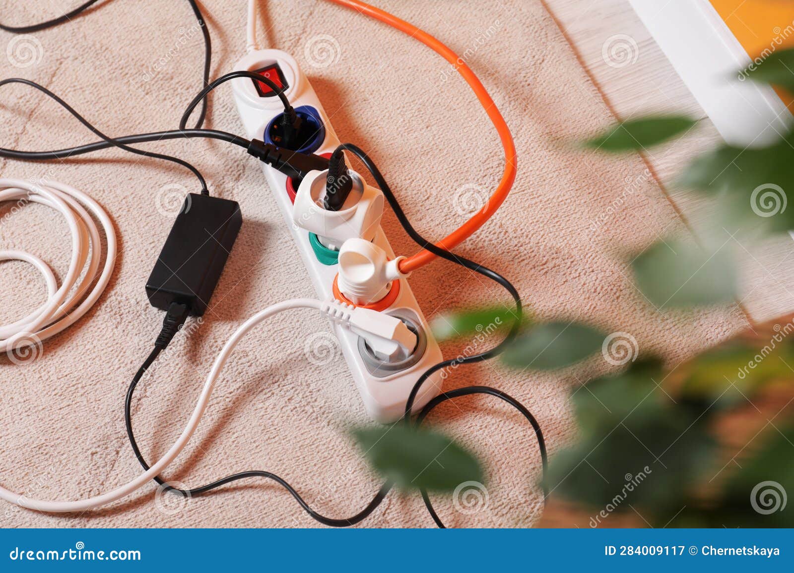 Power Strip with Different Electrical Plugs on White Floor Indoors ...