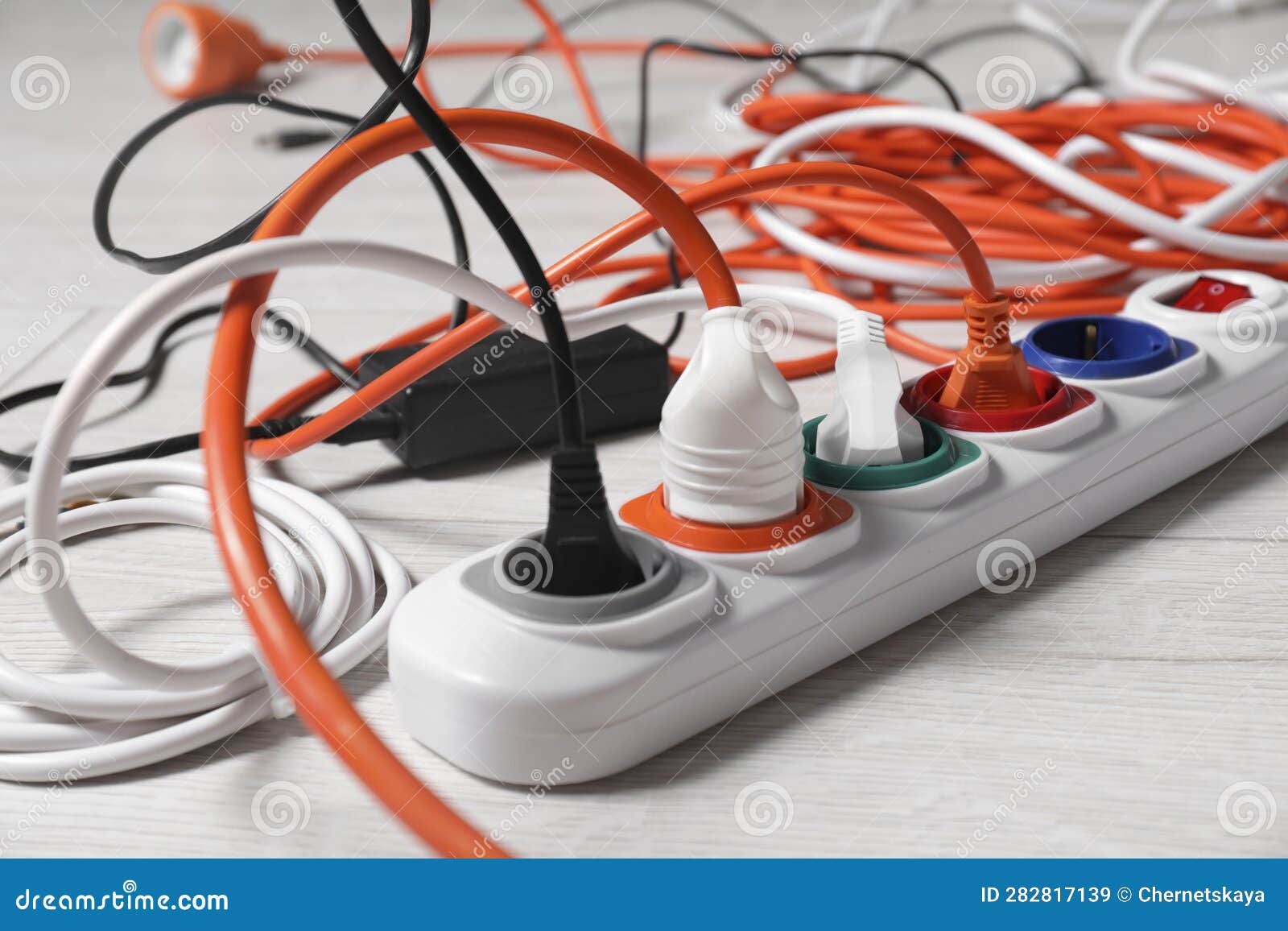 Power Strip with Different Electrical Plugs on White Laminated Floor ...