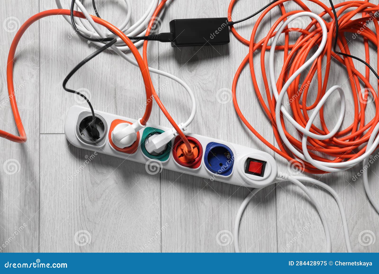 Power Strip with Different Electrical Plugs on White Laminated Floor ...