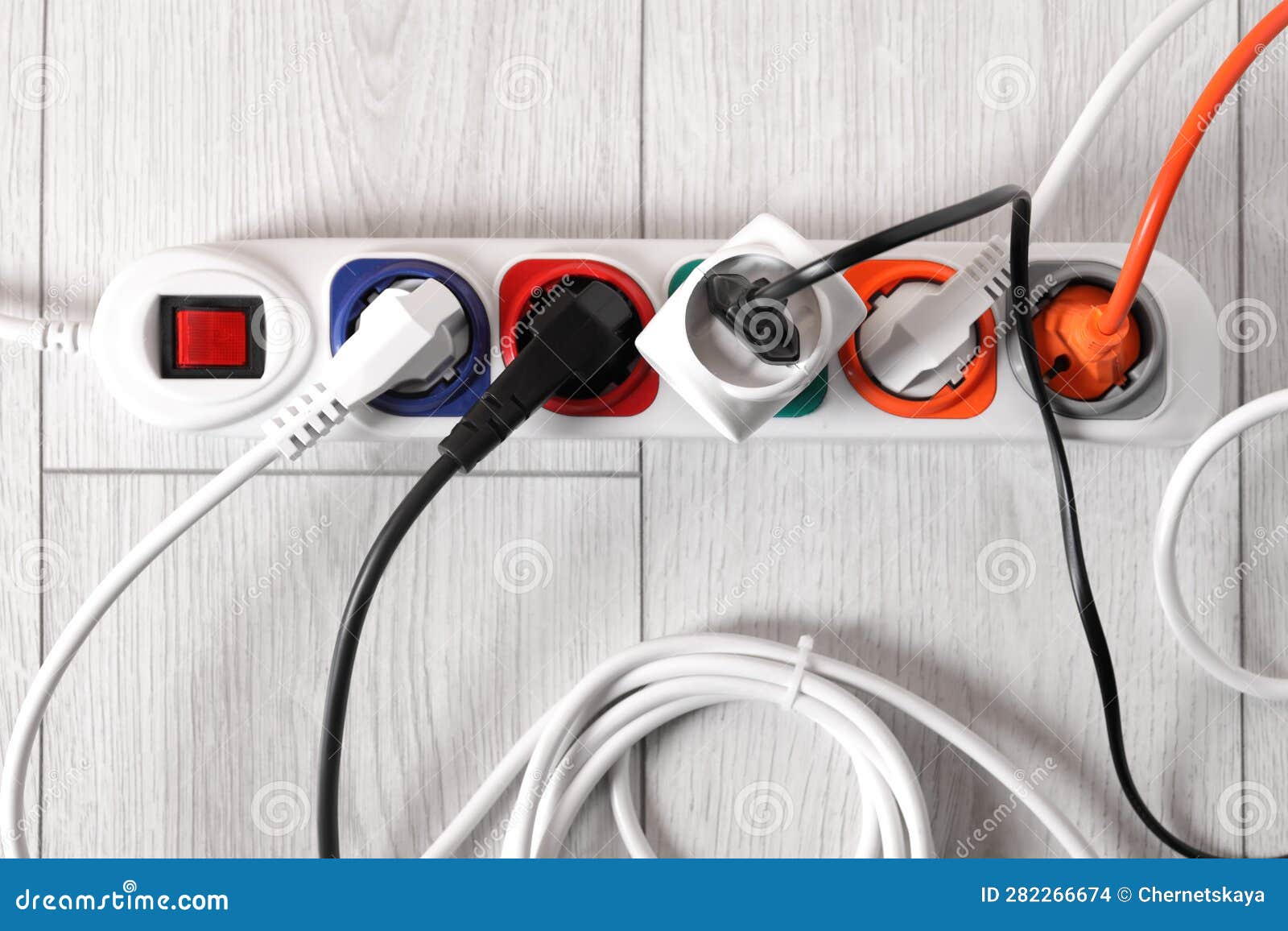 Power Strip with Different Electrical Plugs on White Laminated Floor ...