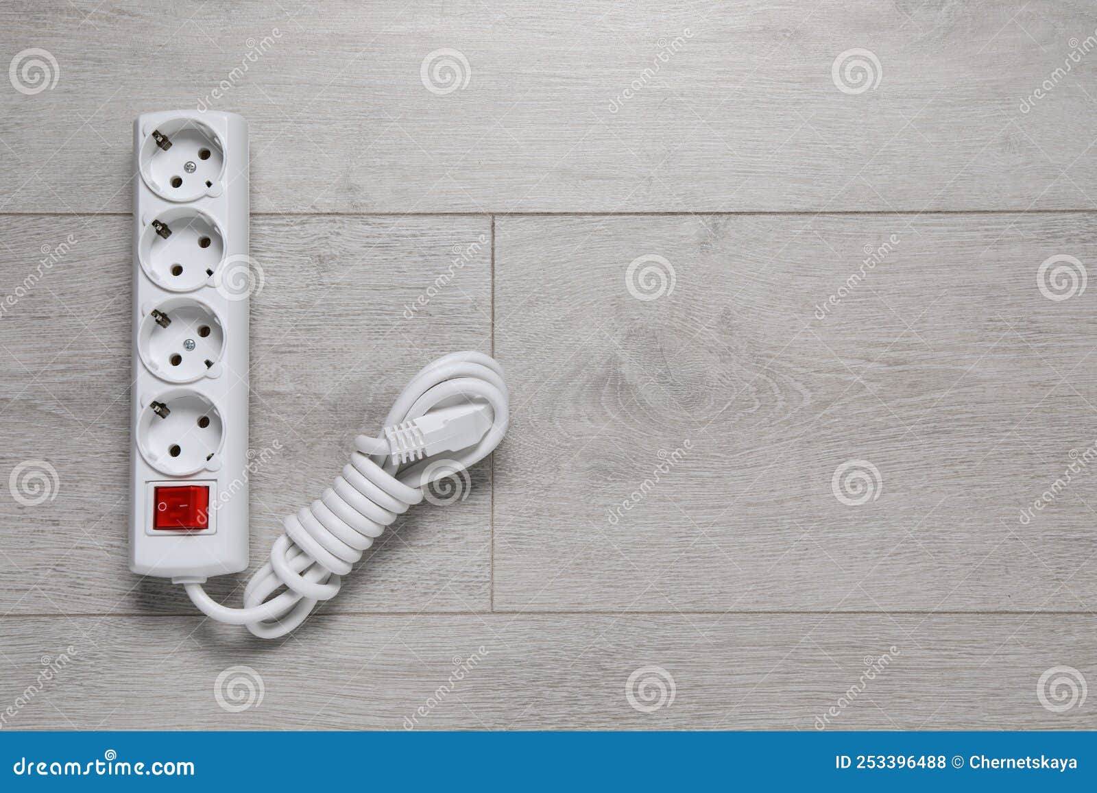Power Strip on Wooden Floor, Top View. Space for Text Stock Photo ...