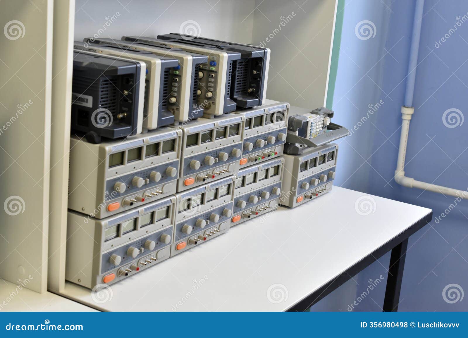 The Power Supply is Electronic in the Laboratory. a Device for ...