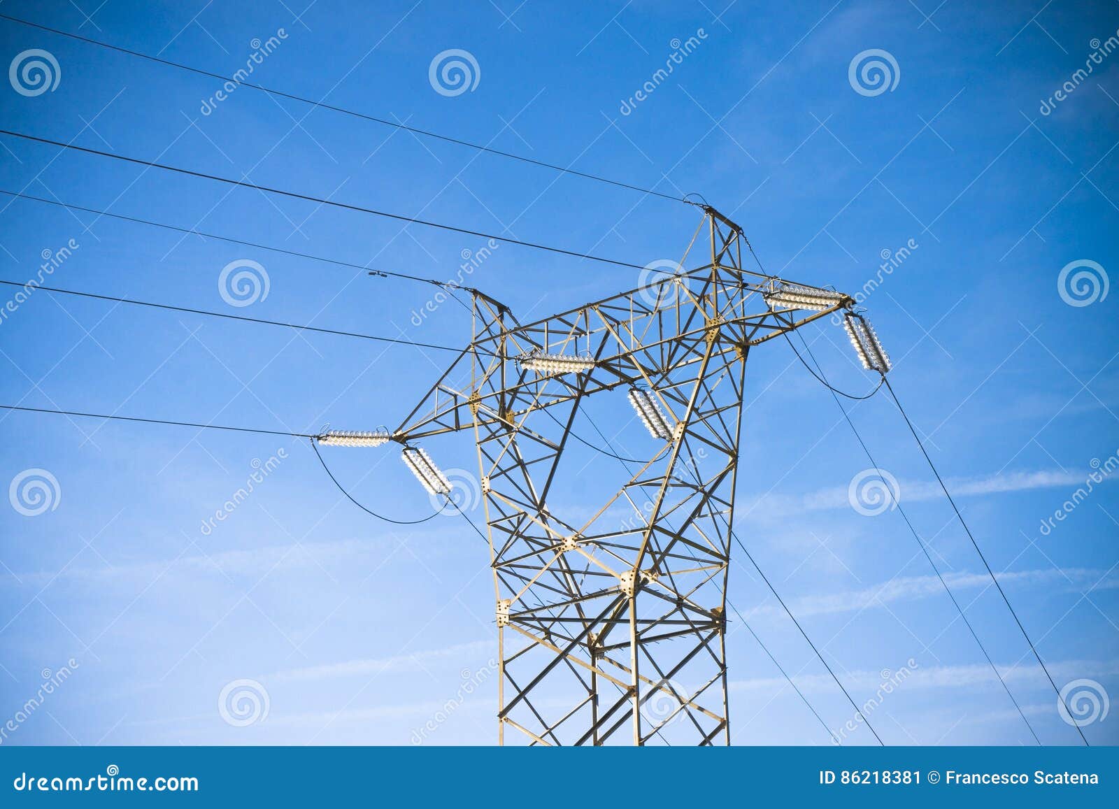 Power Tower and Transmission Lines on Blue Background Stock Image ...