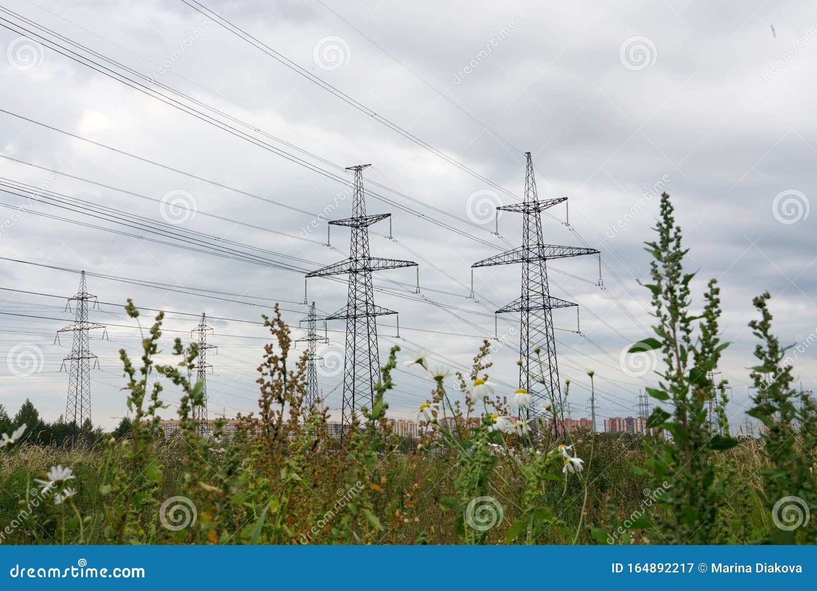 Power Transmission Line in the City with Cloudy Sky Stock Image - Image ...