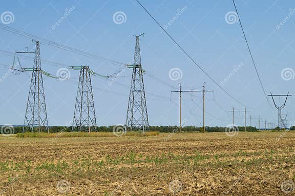 Power Transmission Line Support are in the Field Stock Photo - Image of ...