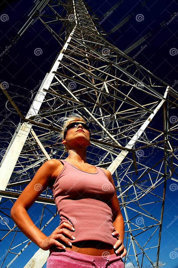 Woman in Front of High Voltage Power Lines Stock Image - Image of ...
