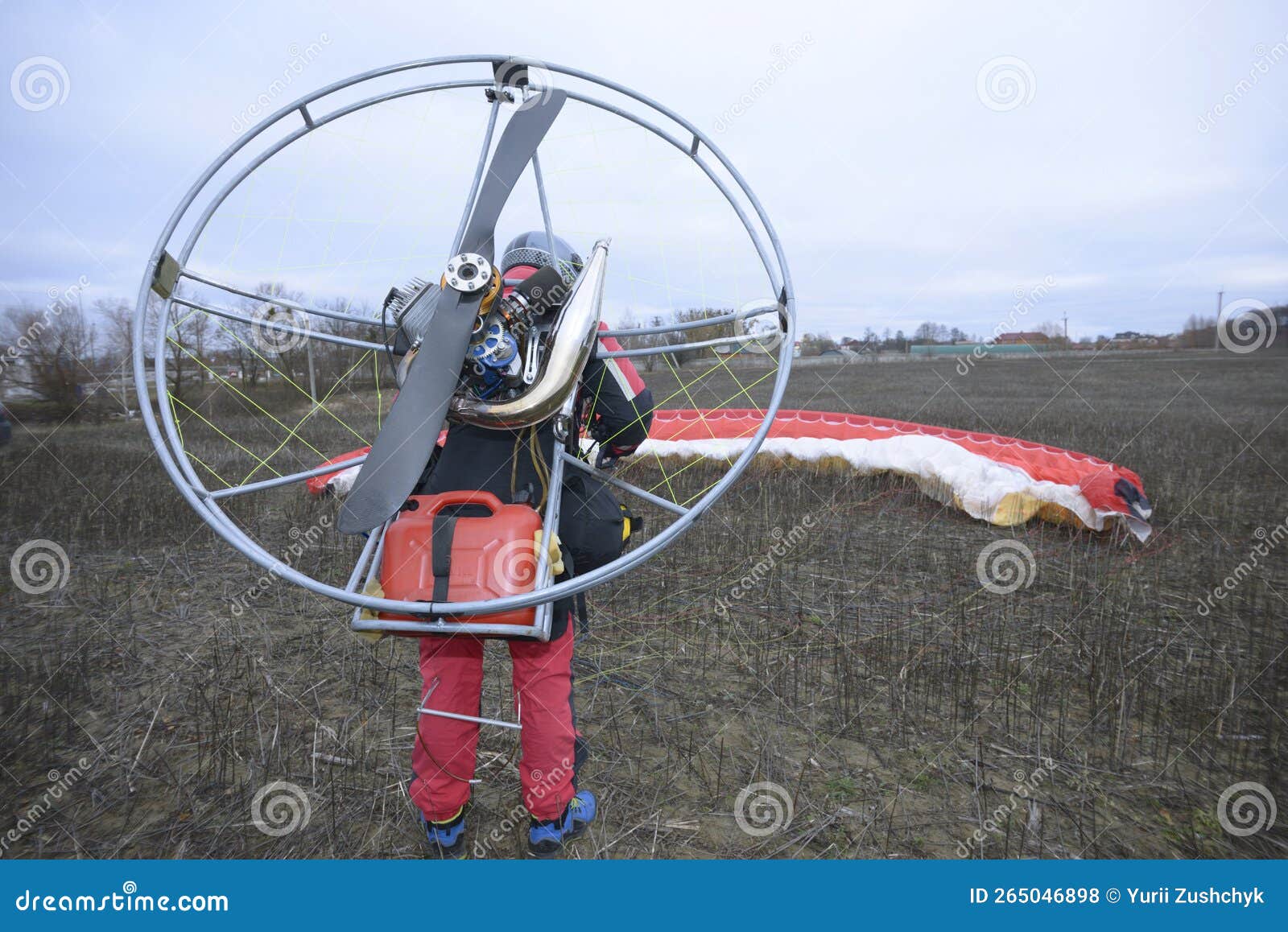 Powered Paragliding. Man Paramotorist Making Preparations for Flight ...