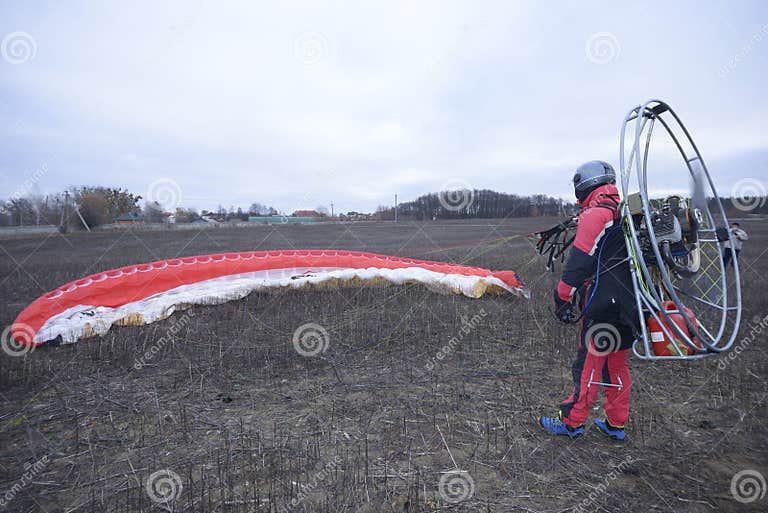Powered Paragliding. Man Paramotorist Making Preparations for Flight ...