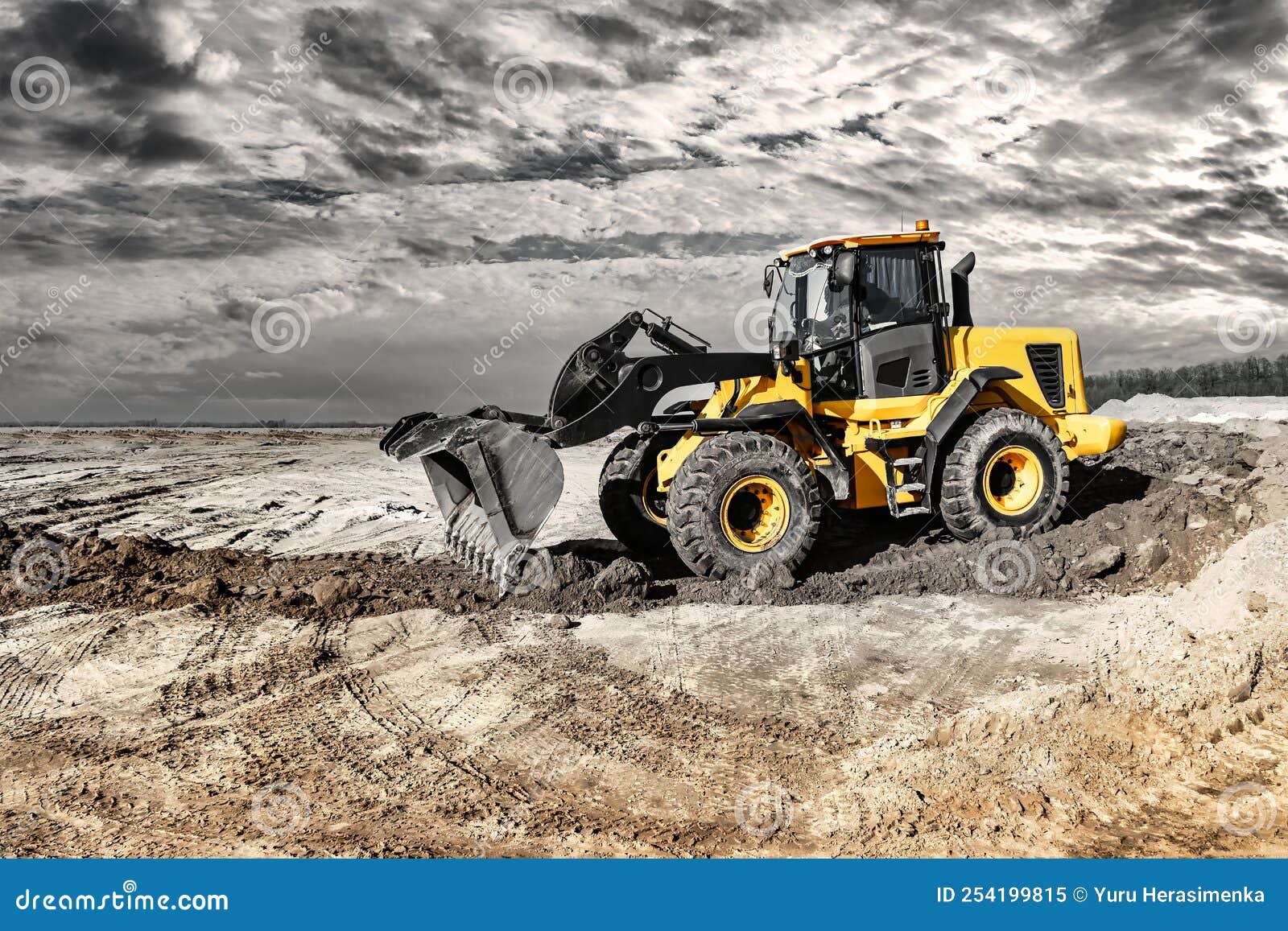 Powerful Bulldozer or Loader Moves the Earth at the Construction Site ...