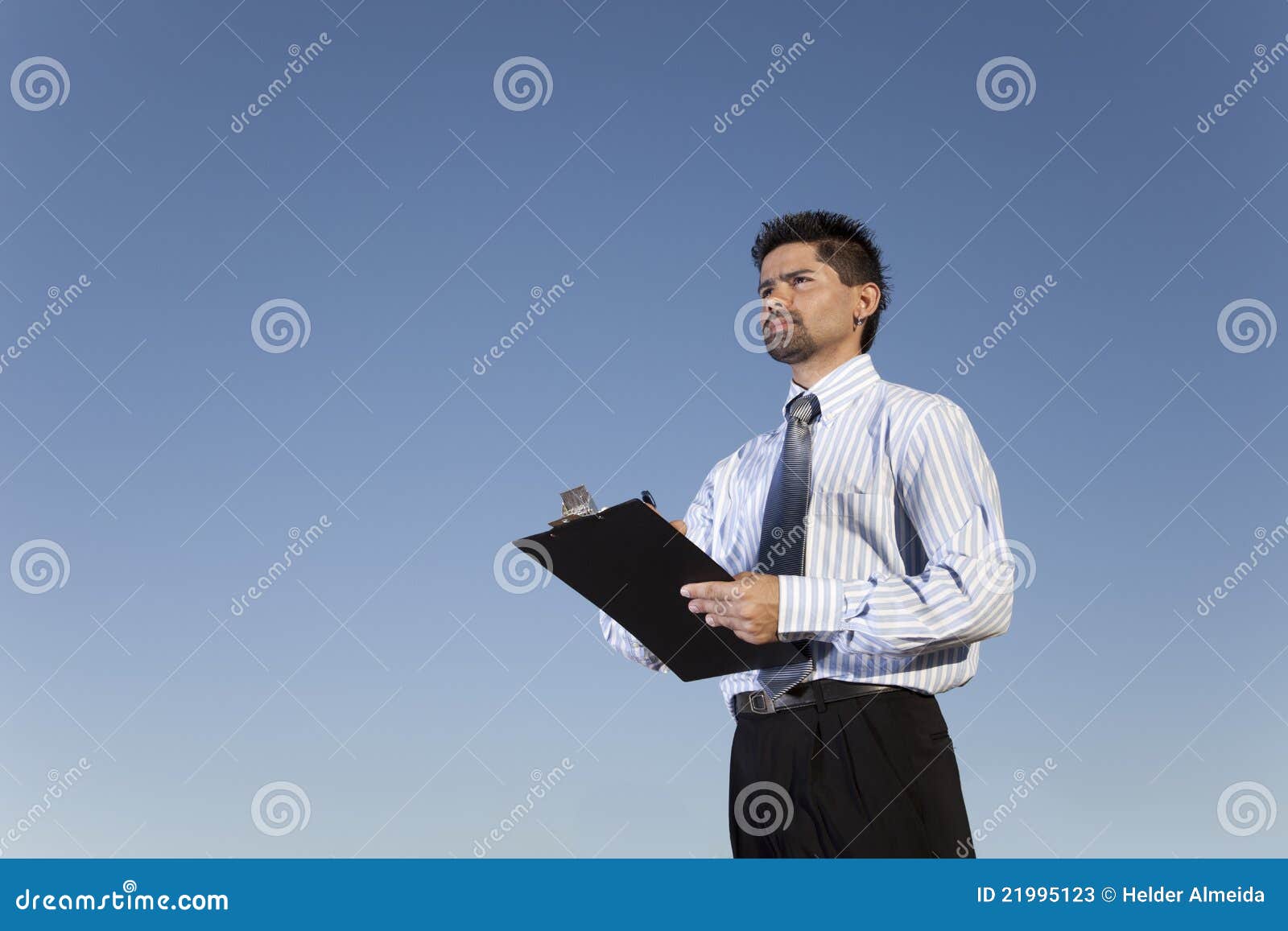 Powerful Businessman Holding a Notepad Stock Image - Image of attitude ...