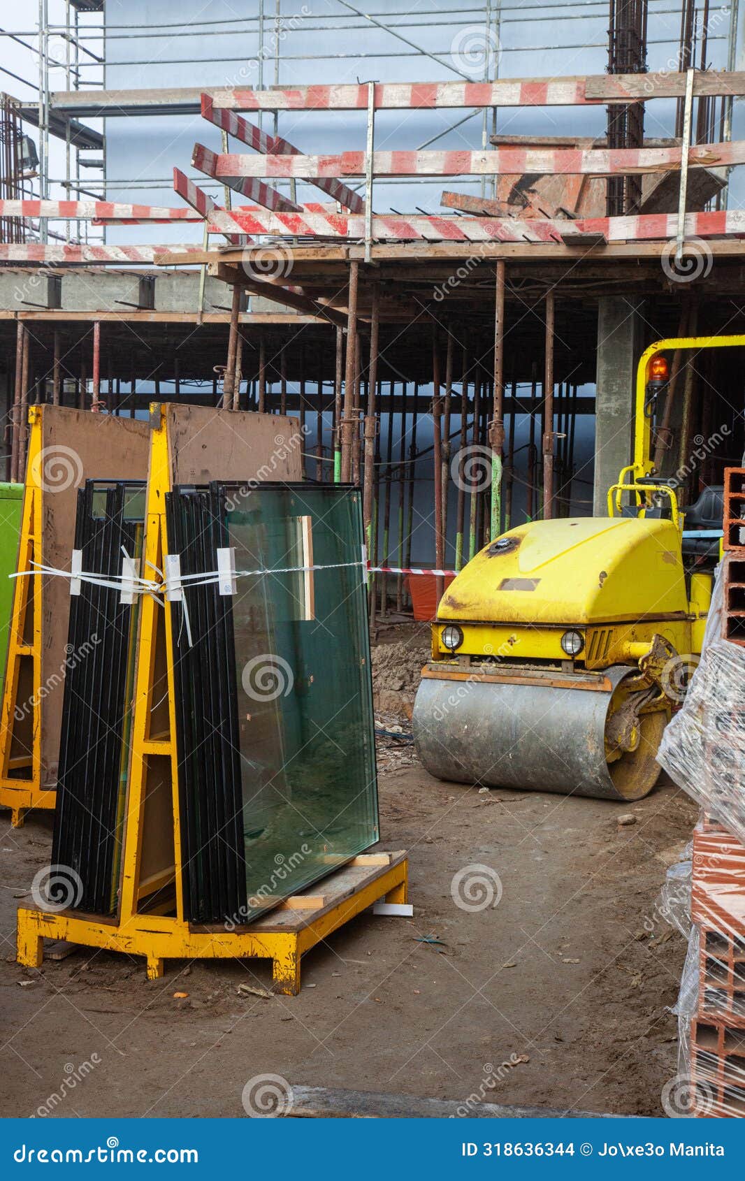 Powerful Construction Compactor at Work, Shaping the Foundation with ...