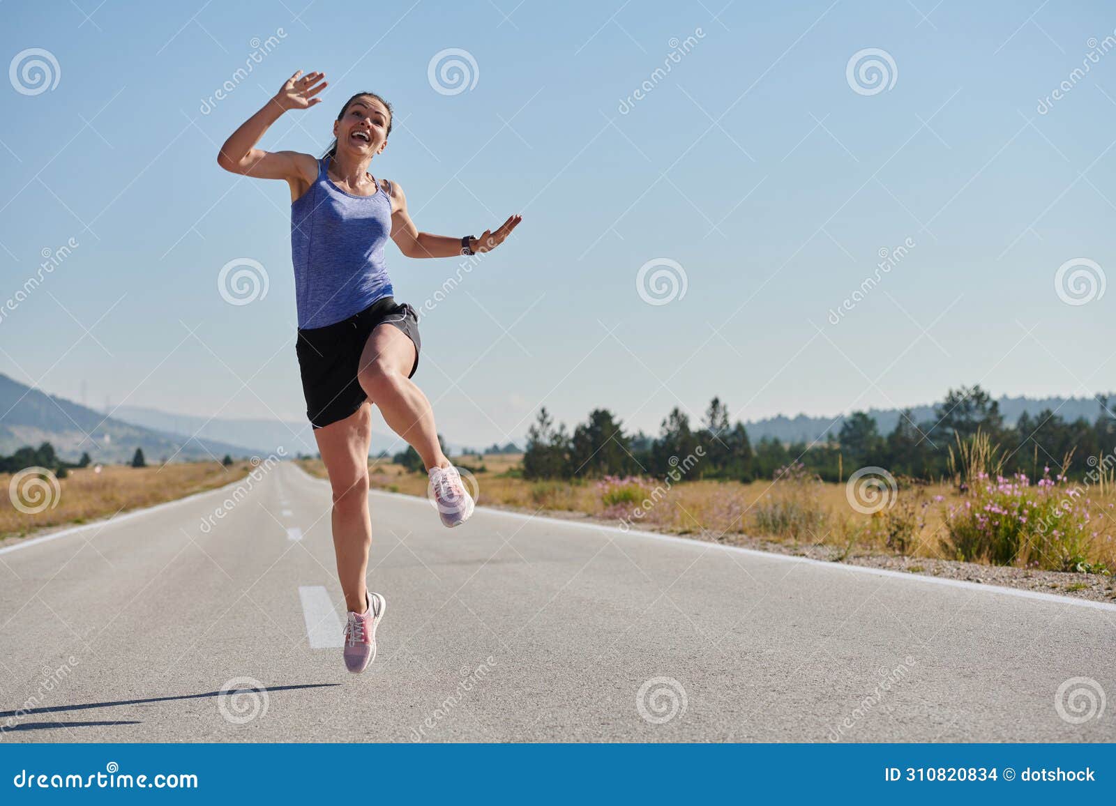 Leap of Victory: Athlete Symbolizes Success and Dedication through Mid ...